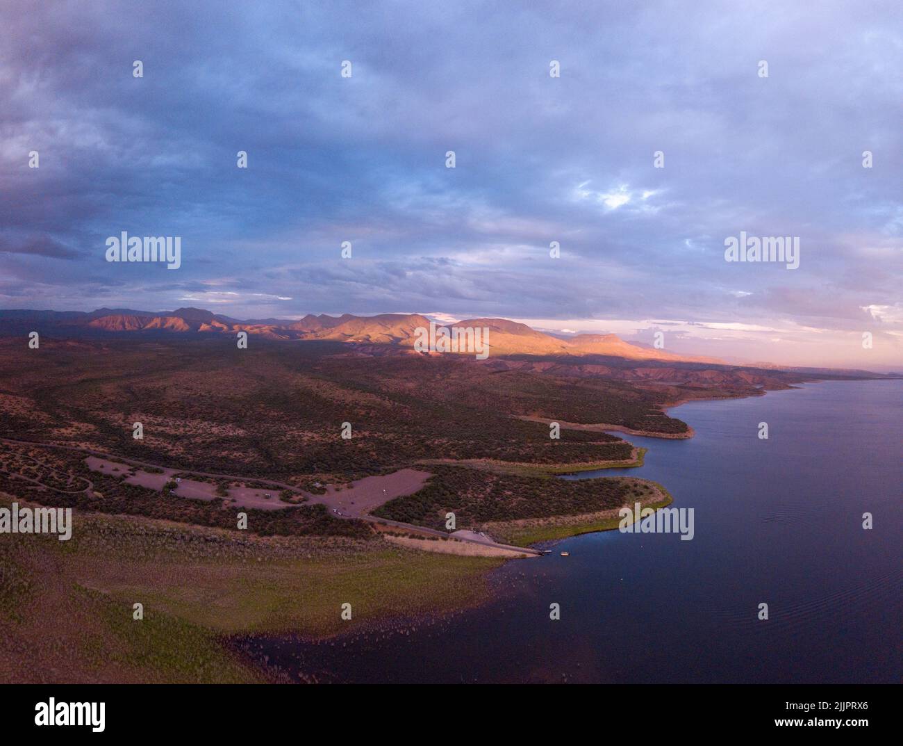 An aerial view of the Lake Roosevelt and the forested areas near the ...