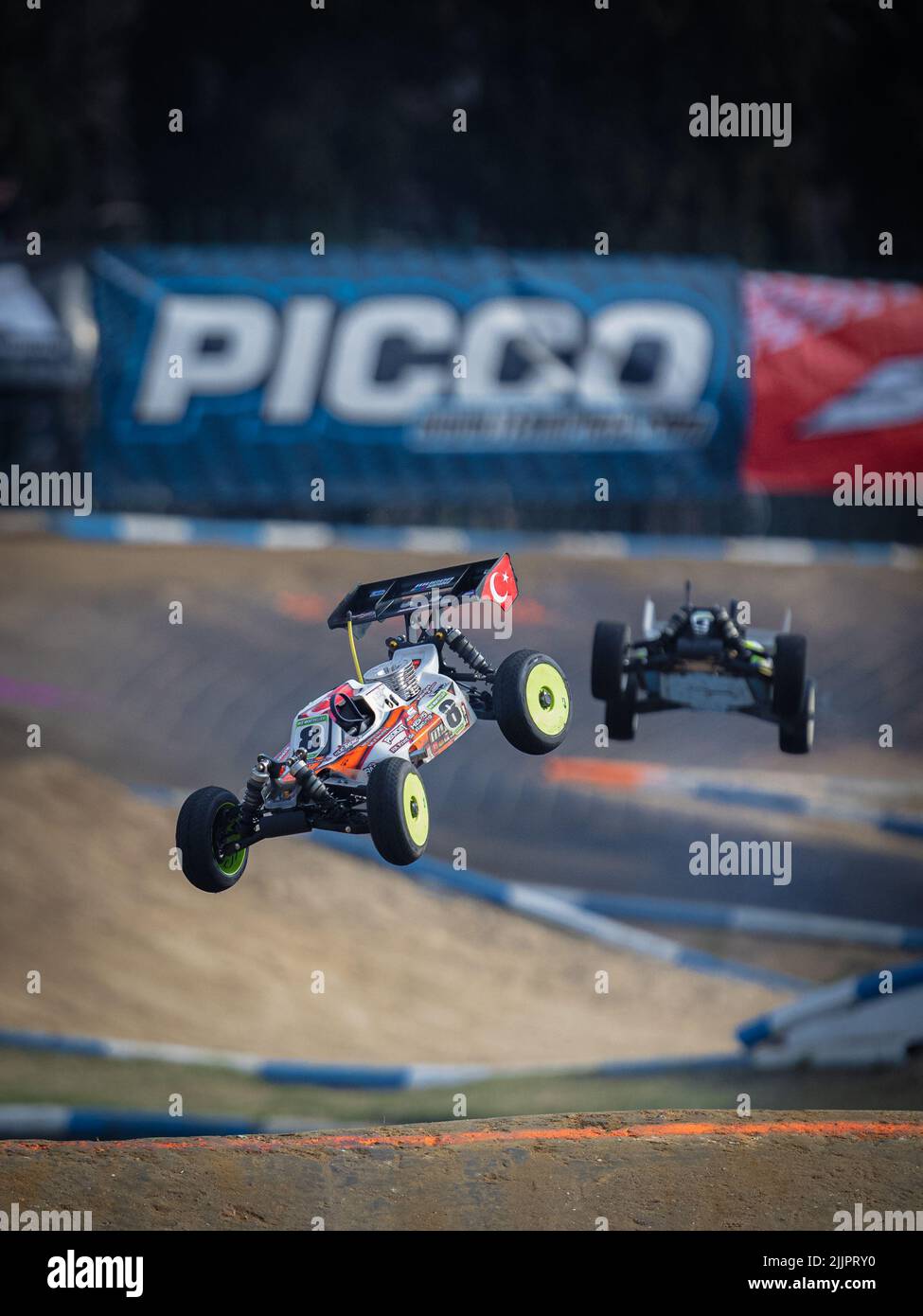 Two racing RC cars on the road, France Stock Photo - Alamy