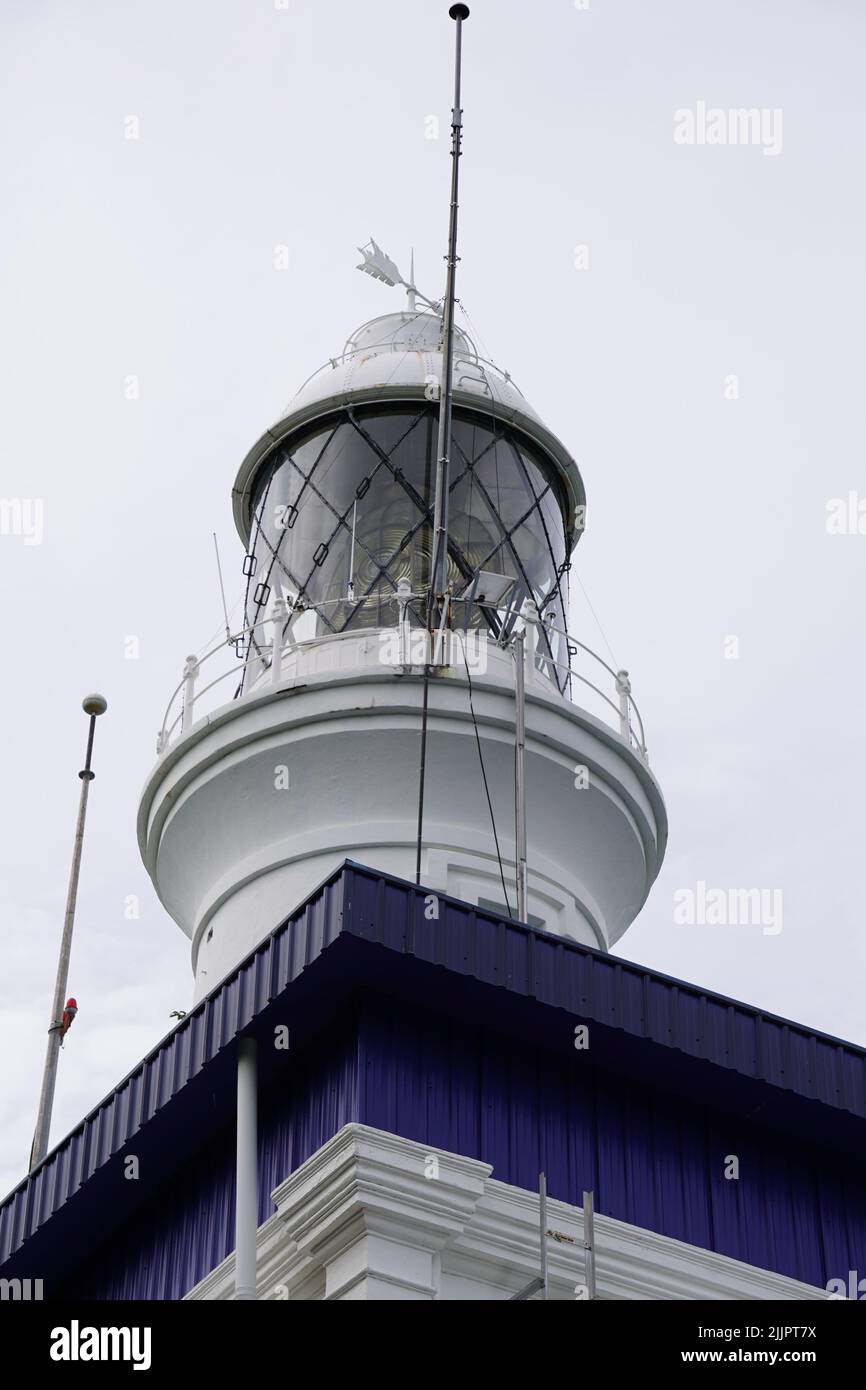 A vertical low angle shot of the Port Dickson Lighthouse in Malaysia ...