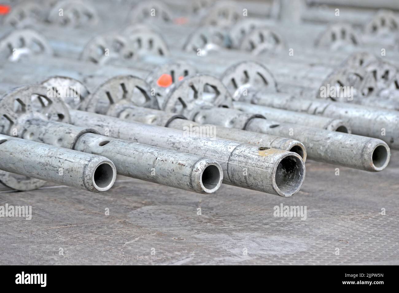 metal construction pylon heap closeup, modern industry diversity Stock ...
