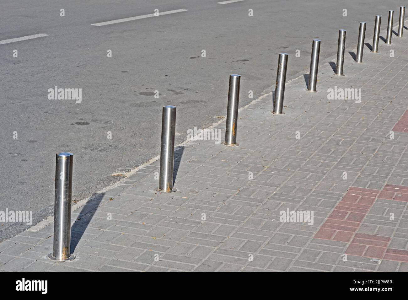 metallic pylon barrier omn the street, modern security diversity Stock ...