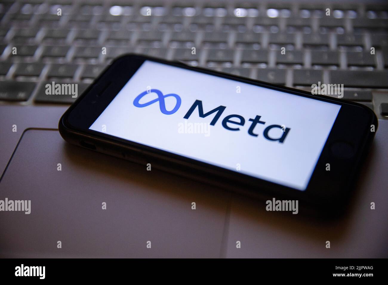 In this photo illustration, a Meta logo is displayed on the screen of a ...
