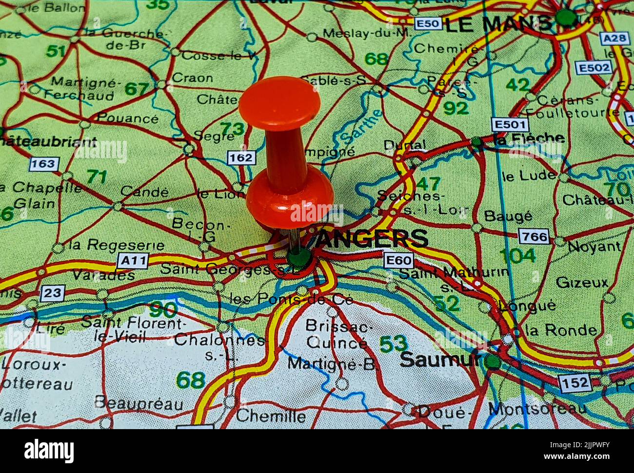 A closeup of a red pin on Angers city on a map Stock Photo - Alamy