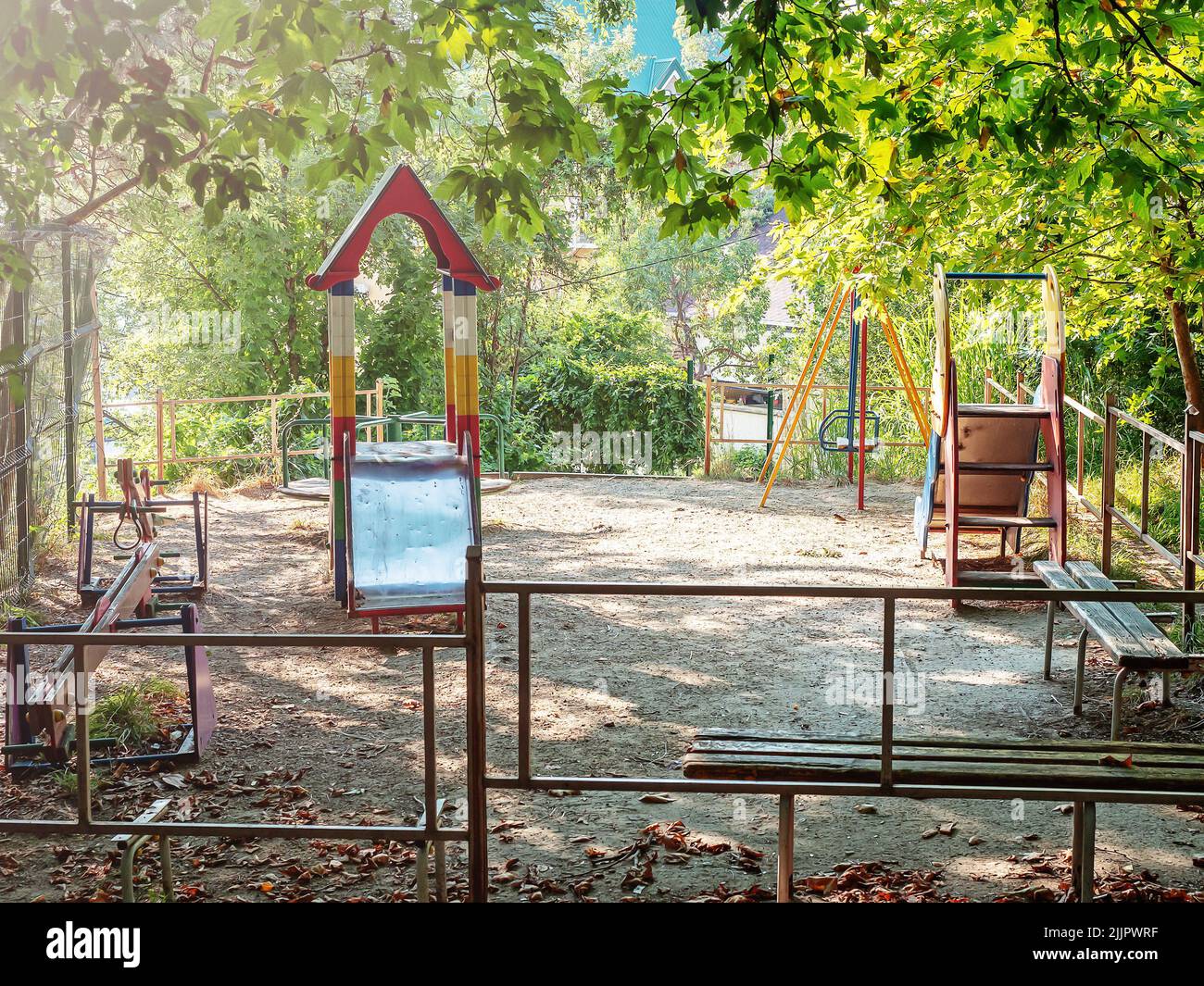 Simple swing in playground hi-res stock photography and images - Alamy