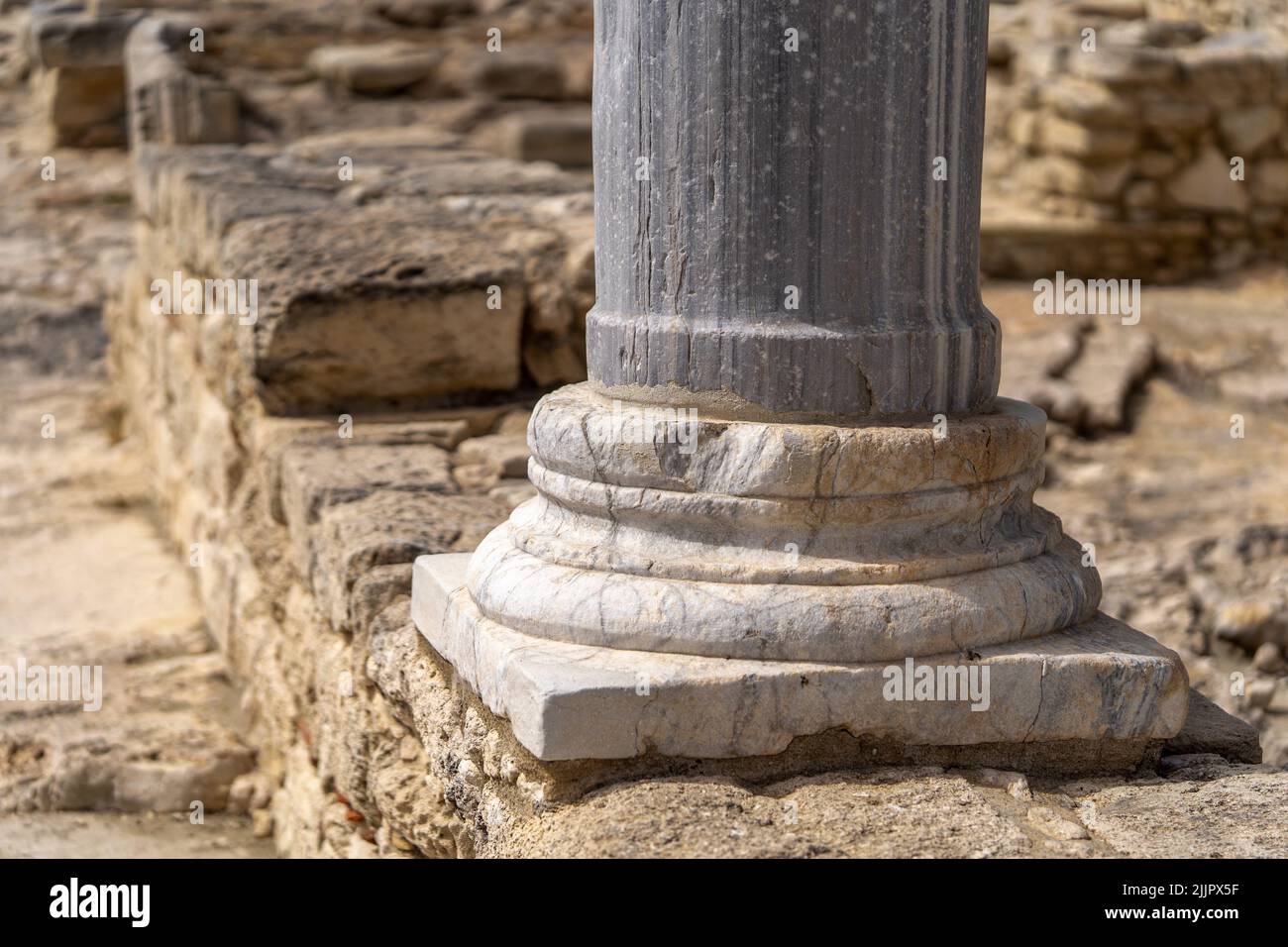 A closeup of the lower part of a greek column Stock Photo - Alamy