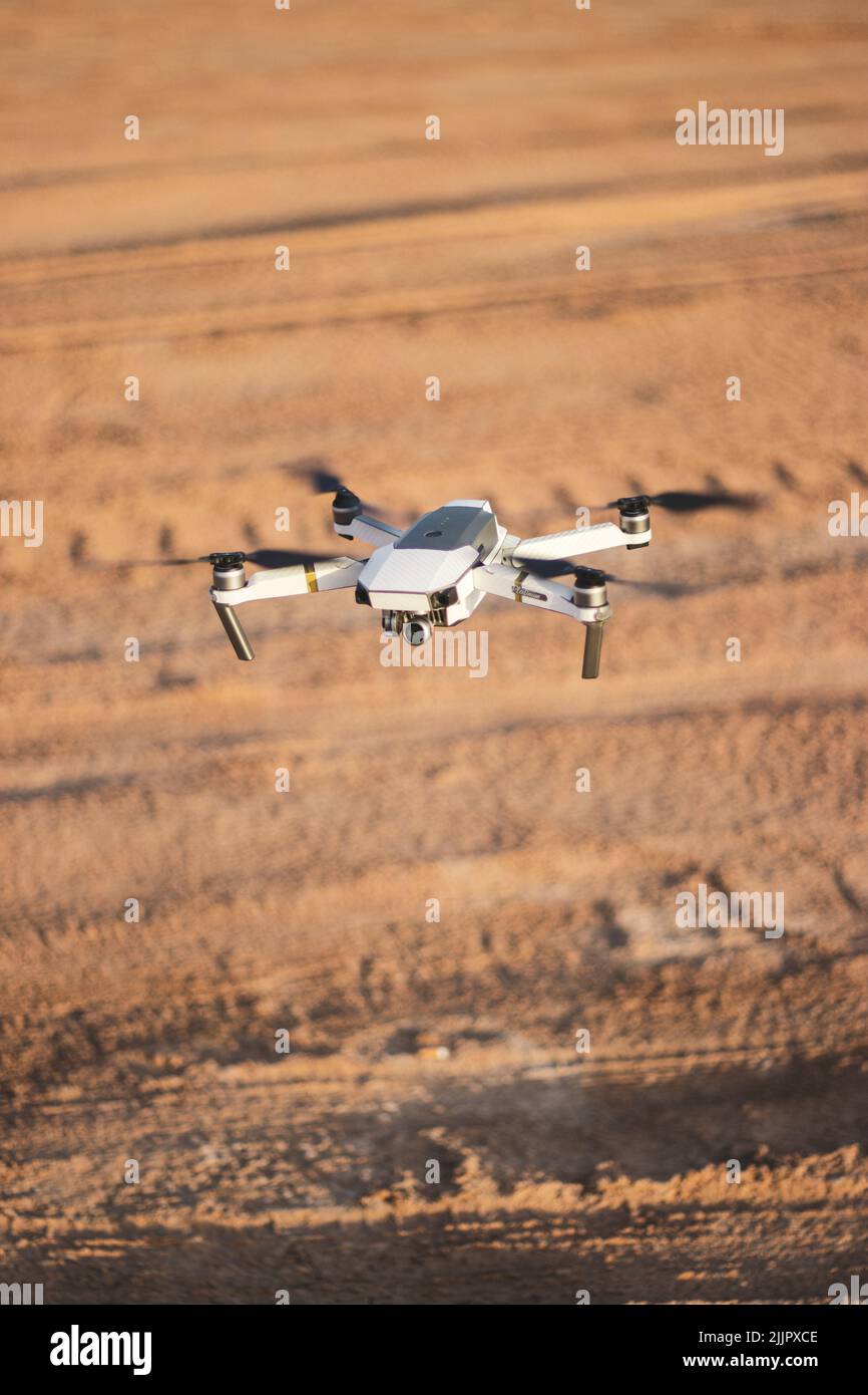 A Dji Mavic pro Drone flying over sahara desert Stock Photo - Alamy