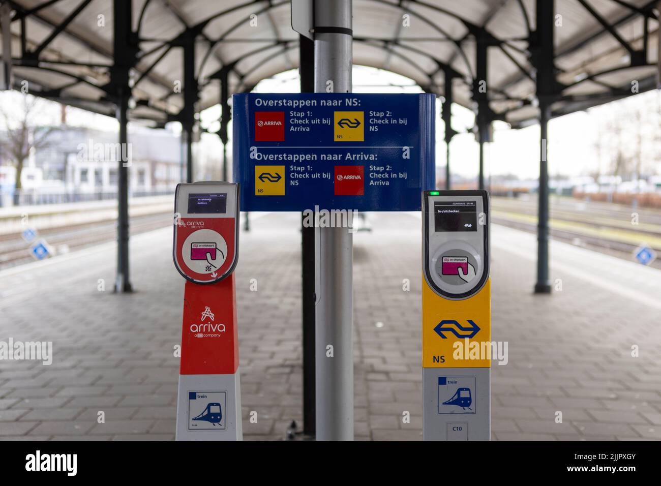 Dutch transfer sign and electronic swipe machines going from one train ...