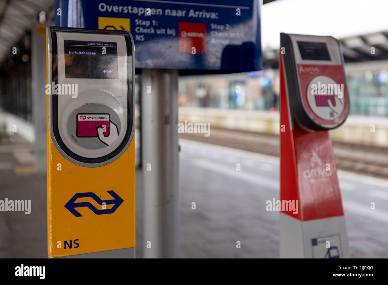 Two Dutch transfer sign and electronic swipe machines going from one ...