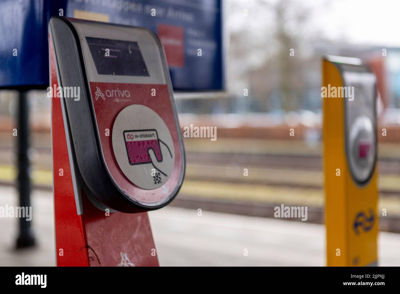 Platform with Dutch transfer sign and electronic swipe machines going ...