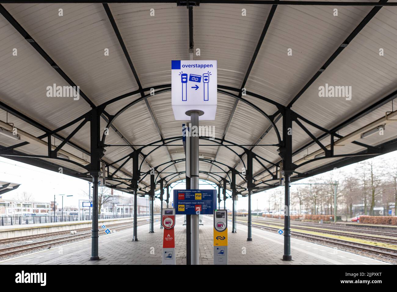 Platform in train station with electronic transfer poles to swipe the ...