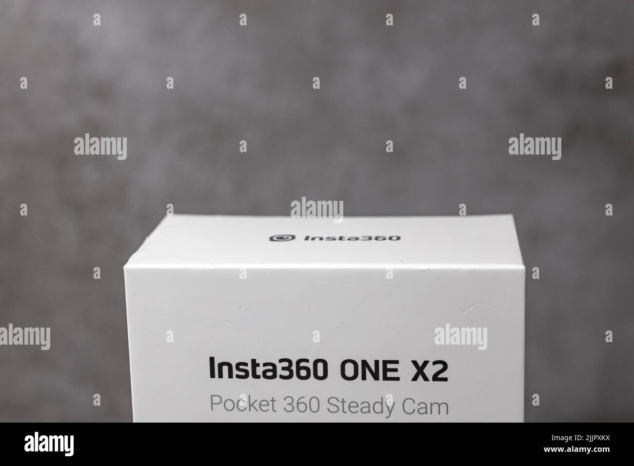 Top part of Insta360 new package camera box against a modern ...