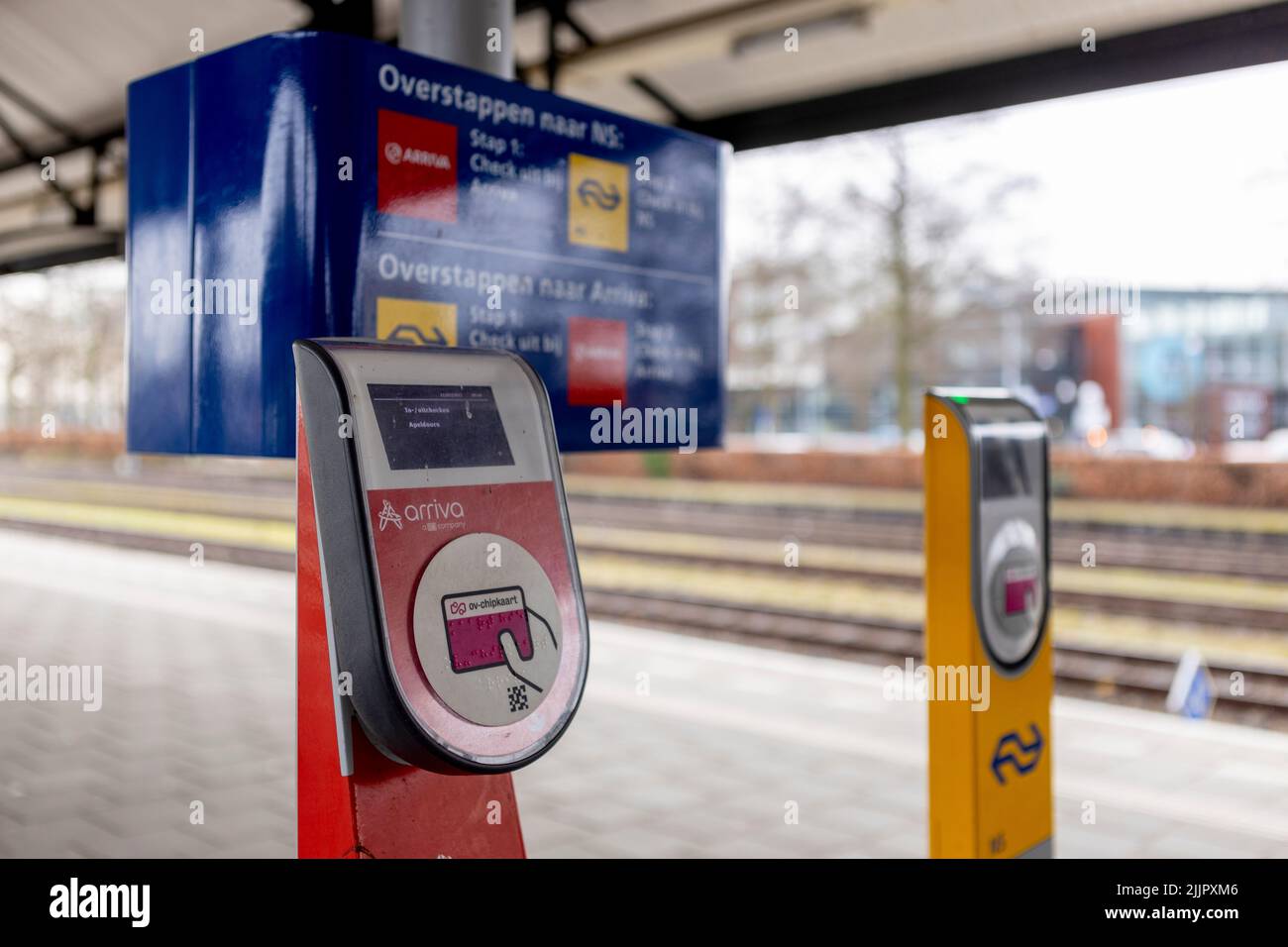 Platform with Dutch transfer sign and electronic swipe machines going ...