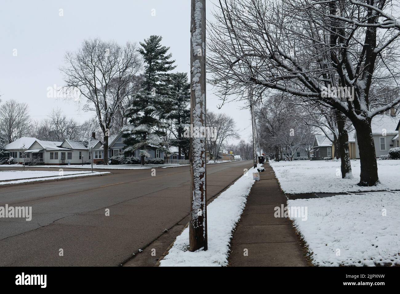 An empty street in a city in winter Stock Photo - Alamy