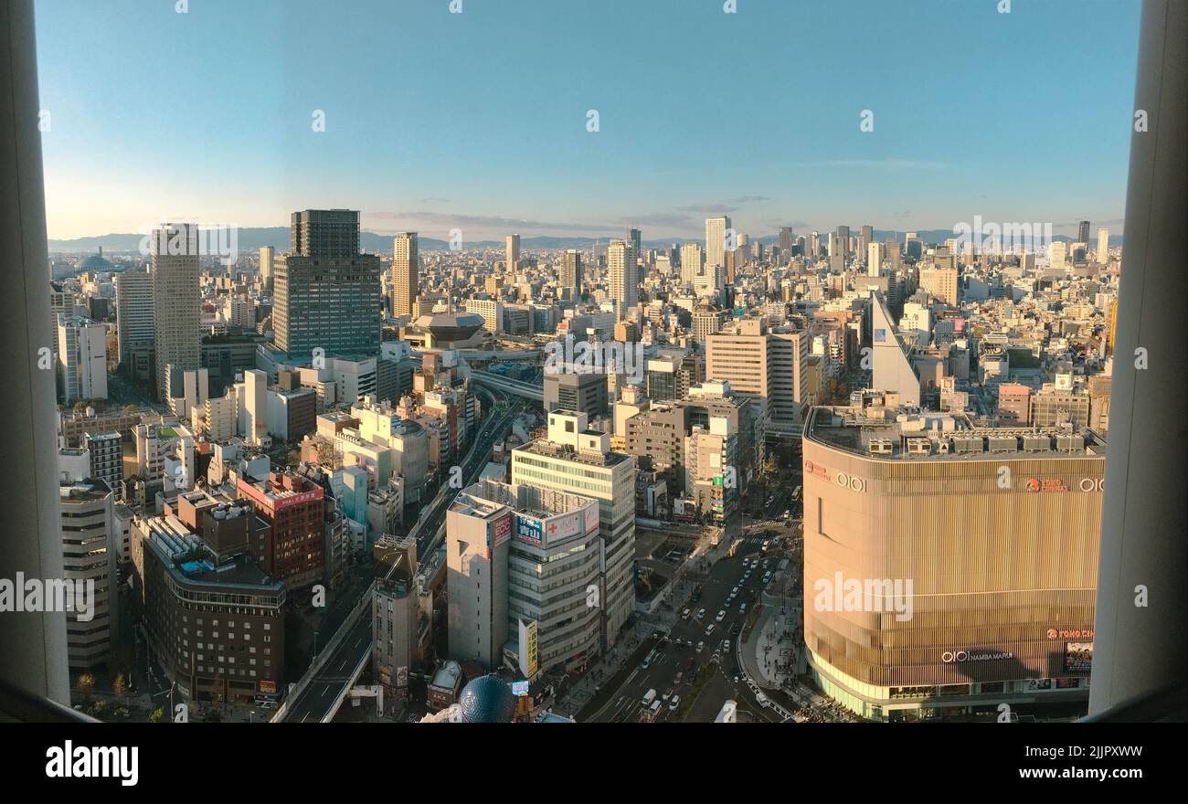 An aerial view of Osaka cityscape in Japan on blue sky background Stock ...