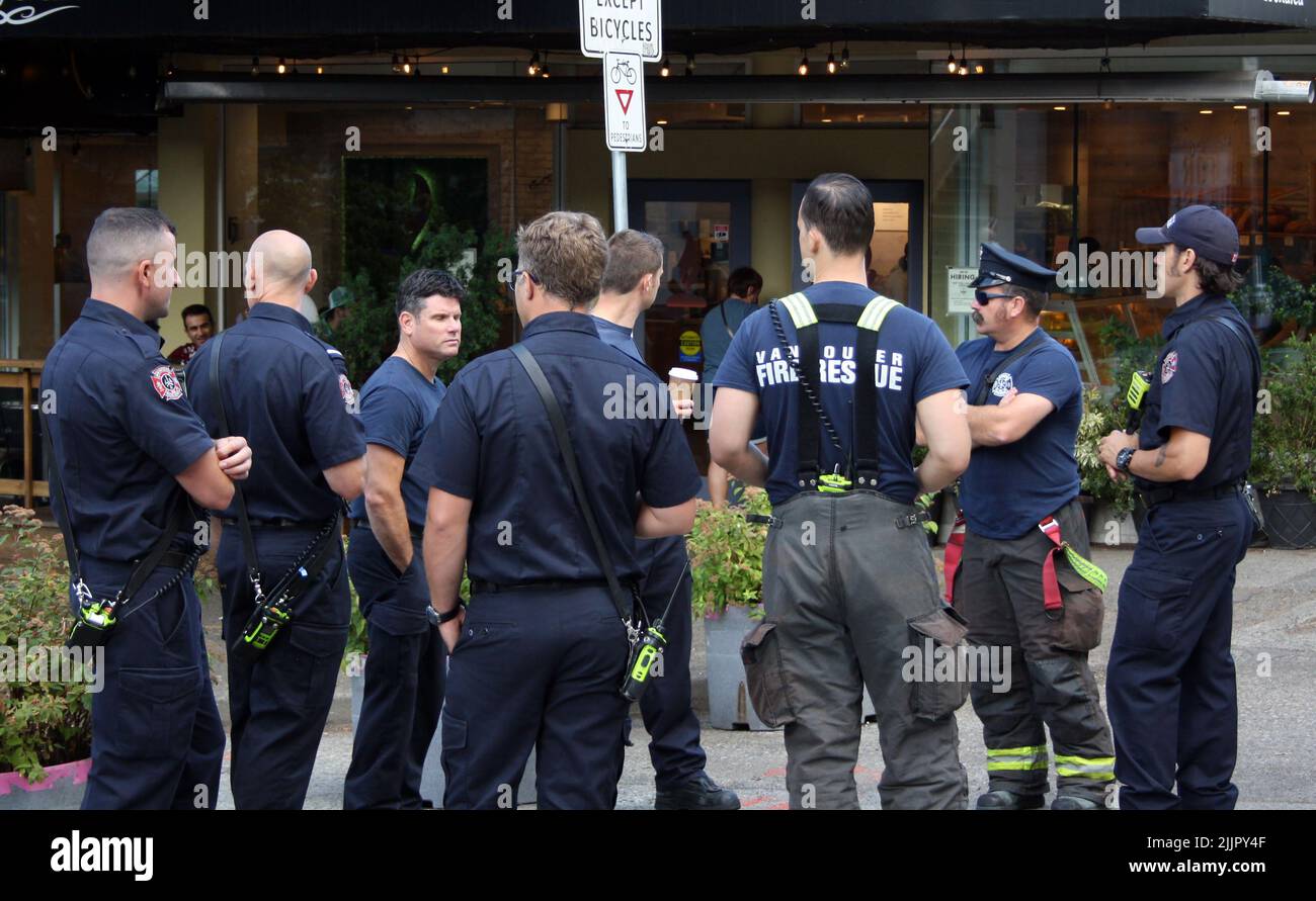 A group of firefighters in downtown Vancouver, British Columbia, Canada ...