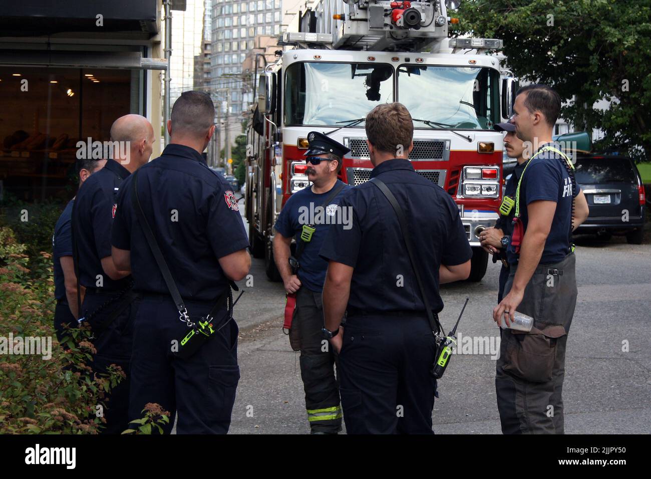 A group of firefighters in downtown Vancouver, British Columbia, Canada ...