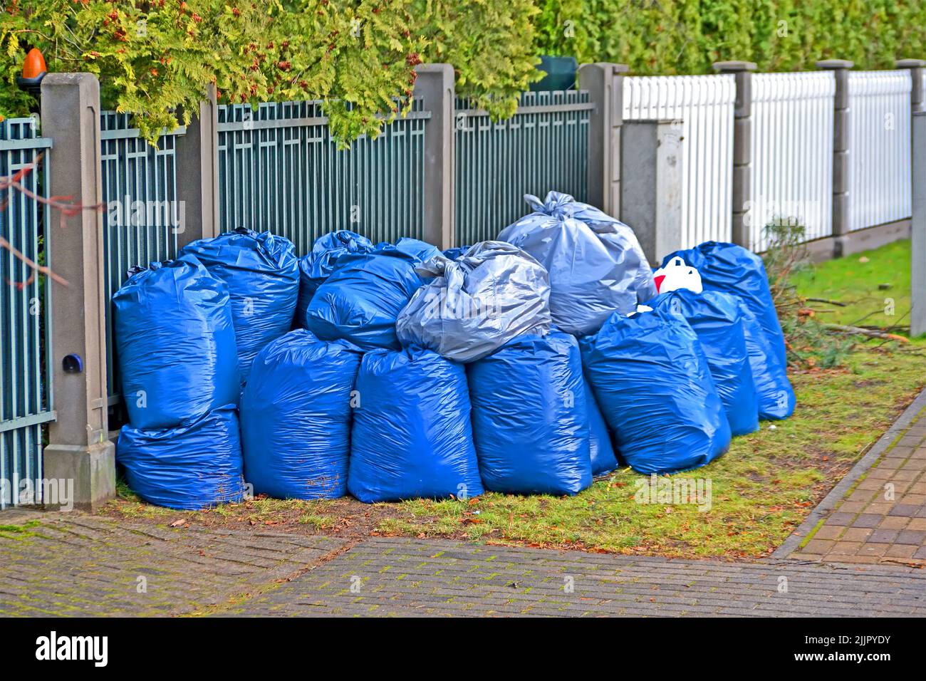 Dustbin many garbage bags hi-res stock photography and images - Alamy