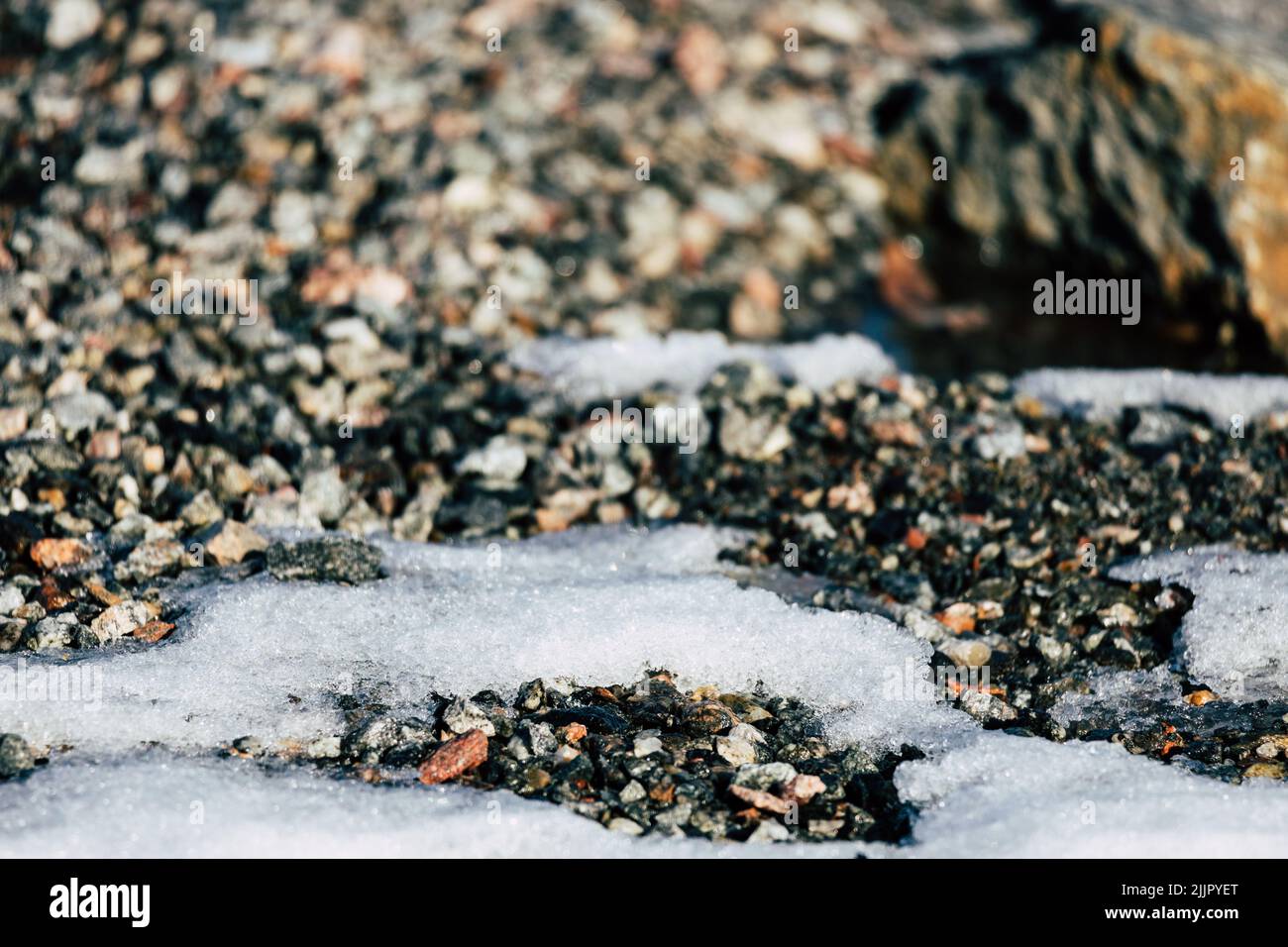 Gravel on snow hi-res stock photography and images - Alamy