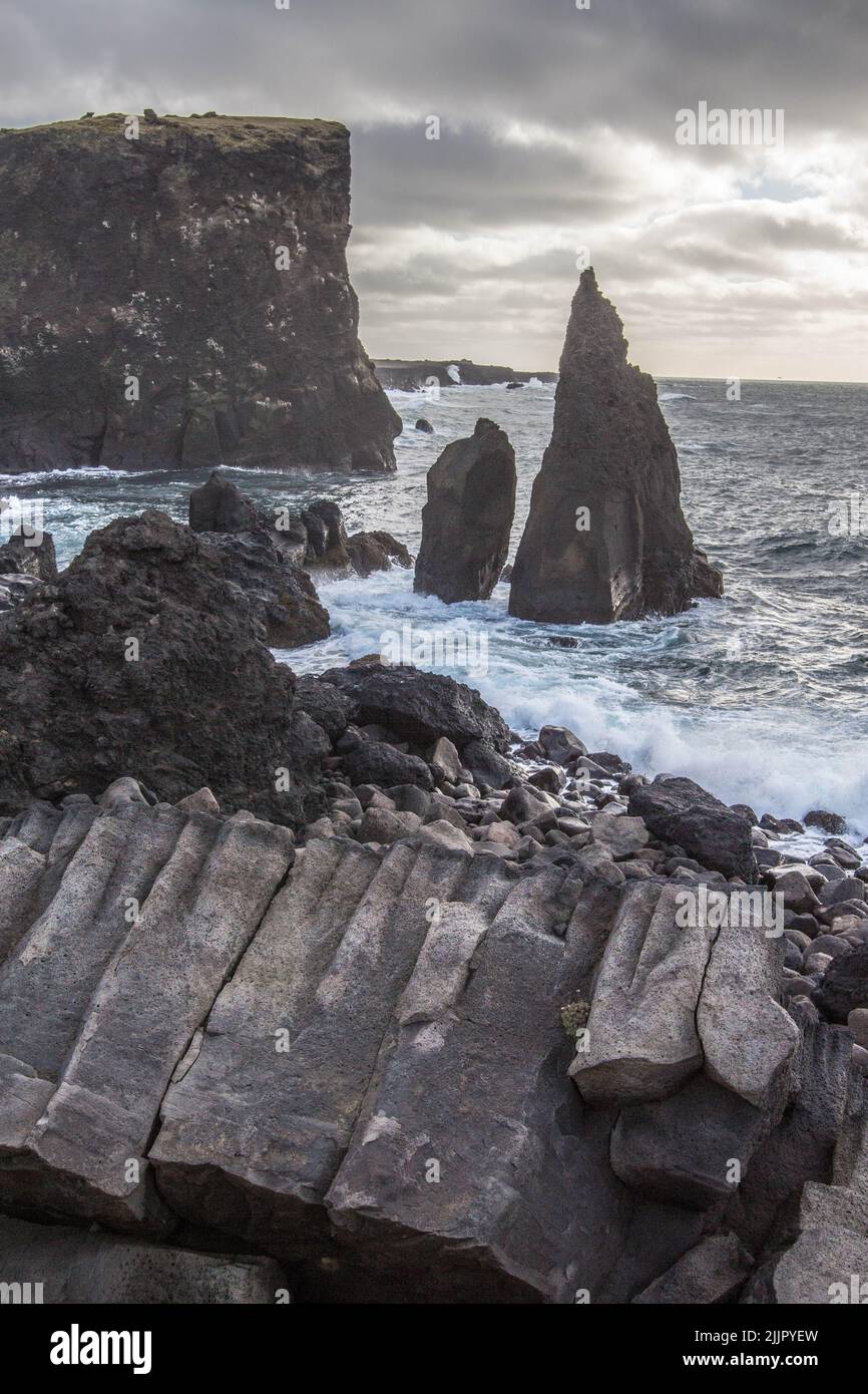 A vertical shot of the volcanic cliffs in Reykjanesta, Iceland Stock ...
