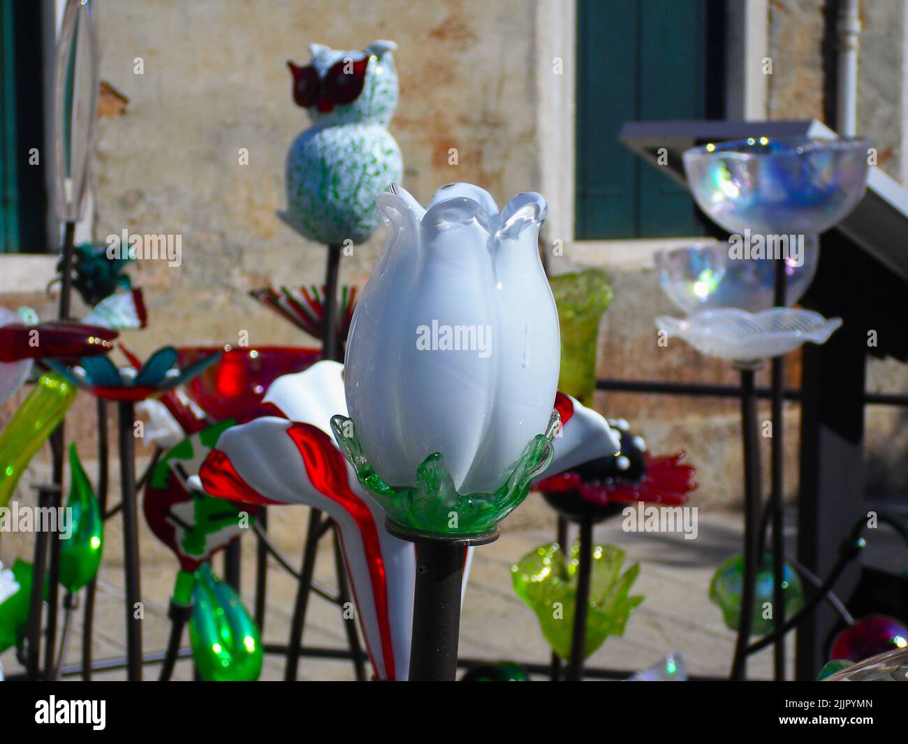 A shallow focus a crystal flower art decoration on one of the streets ...