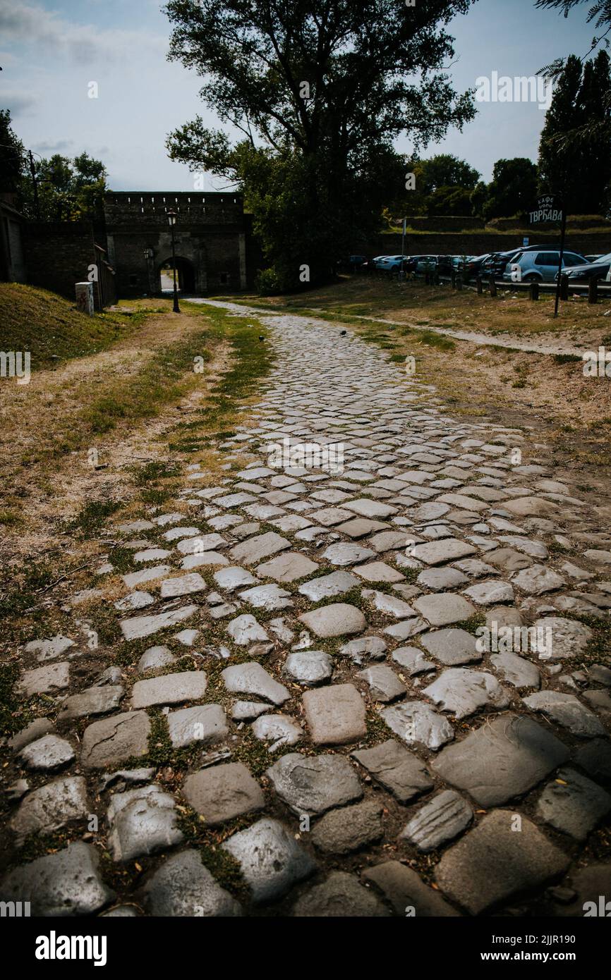 Stone path through park hi-res stock photography and images - Alamy