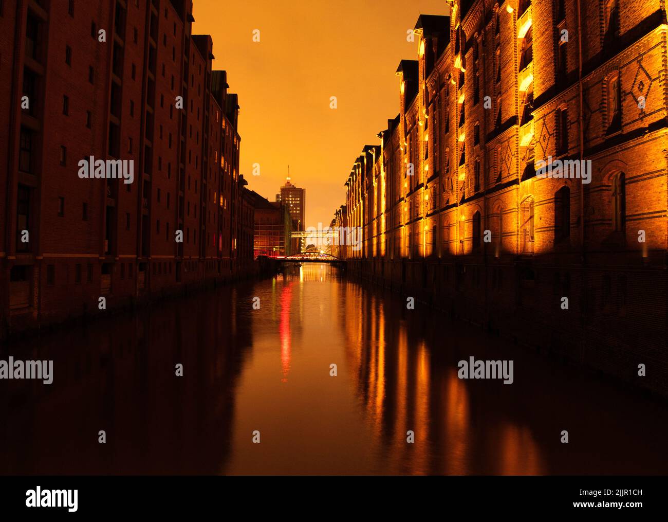 A scenic view of a river and beautiful buildings at the sunset in ...