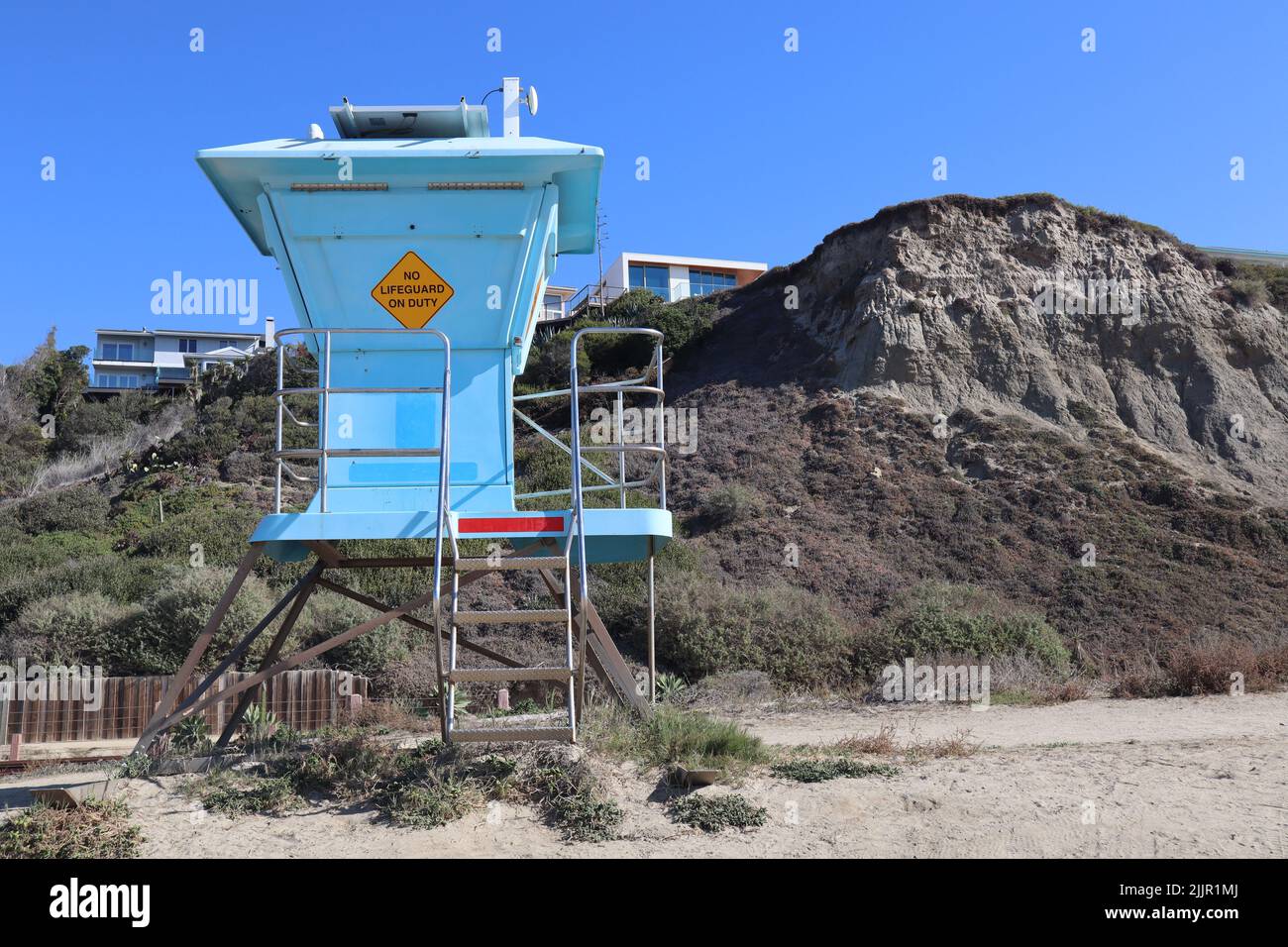 A lifeguard tower in front of seaside bluffs in San Clemente ...
