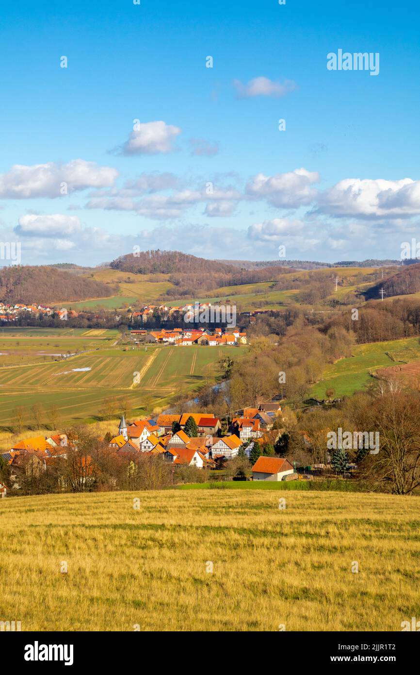 A vertical shot of meadows and architecture at the Werra valley ...