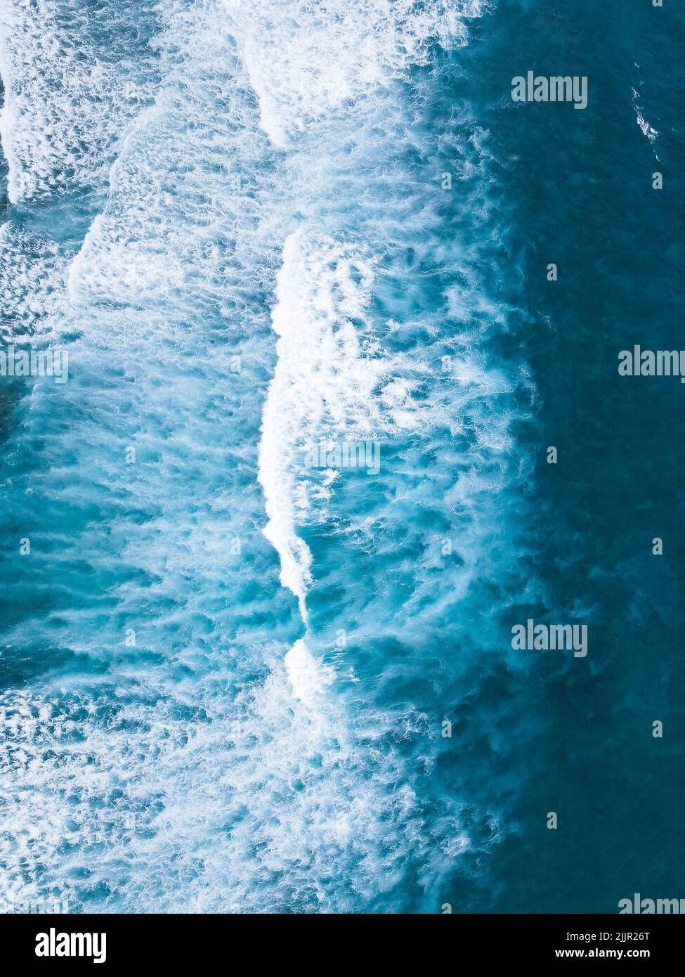 A vertical aerial view of ocean waves Stock Photo - Alamy