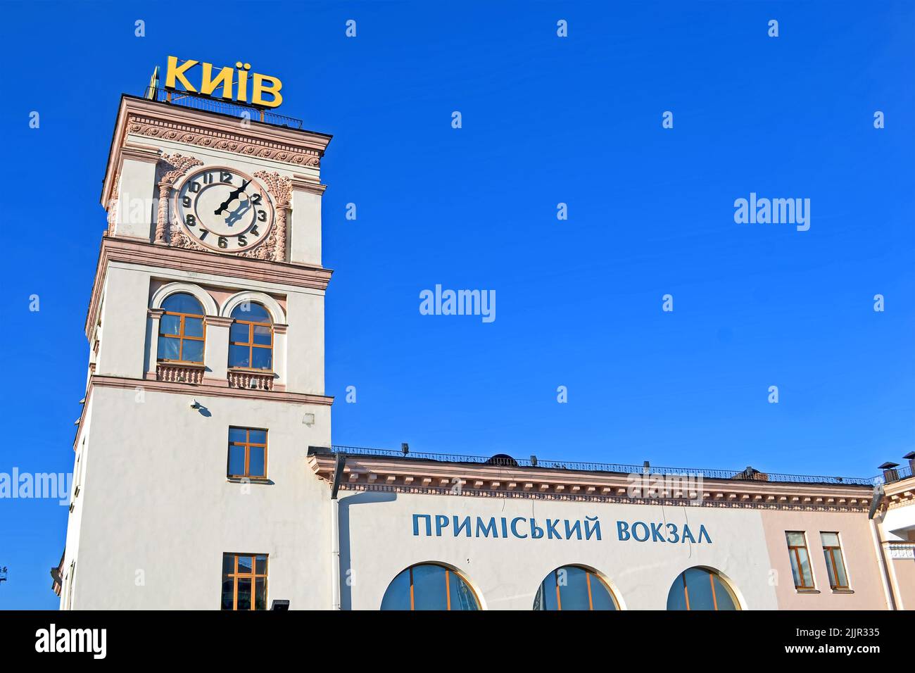 Kyiv logo with large clocks on the tower of main railway domestic ...