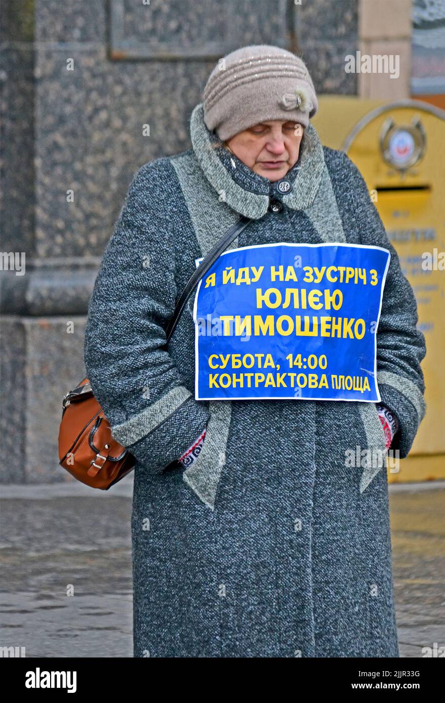 Unknown woman in grey coat with Julia Timoshenko pre-elections meeting ...