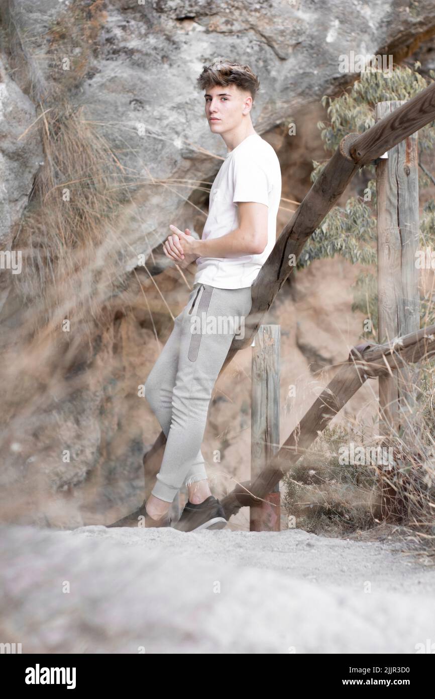 Man on railing hi-res stock photography and images - Alamy