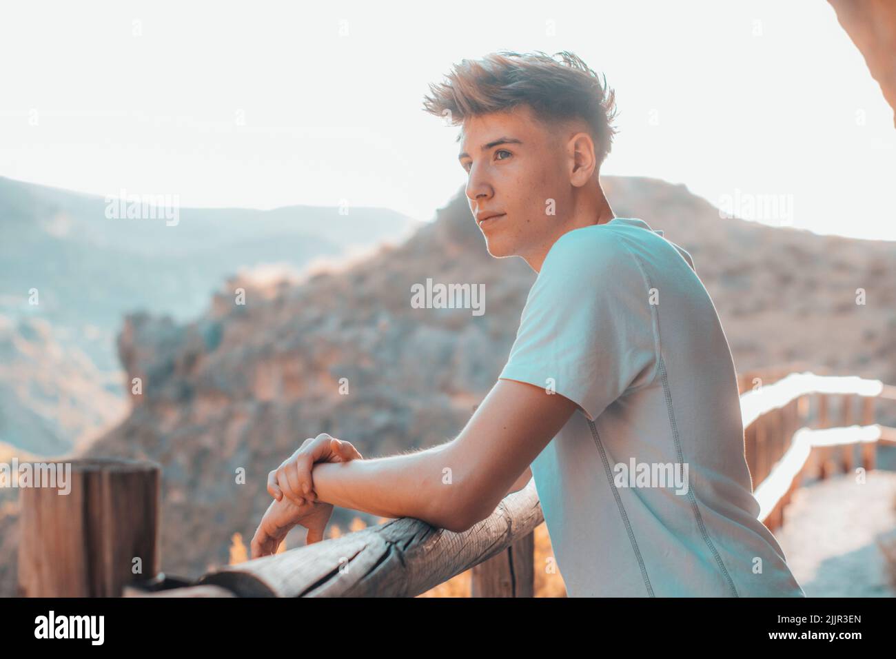 Lean on railing hi-res stock photography and images - Alamy