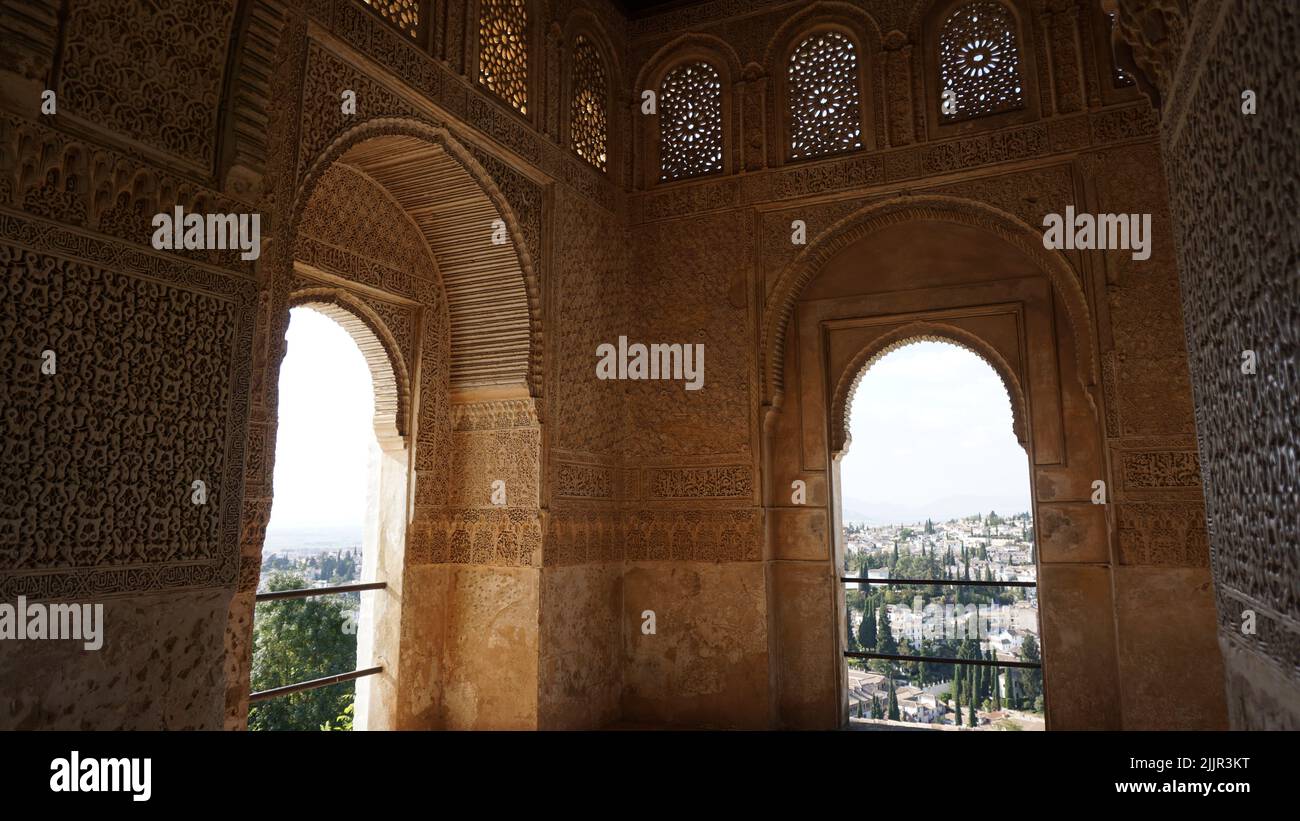 A beautiful view of the Islamic Arabic detail on the walls of Alhambra ...
