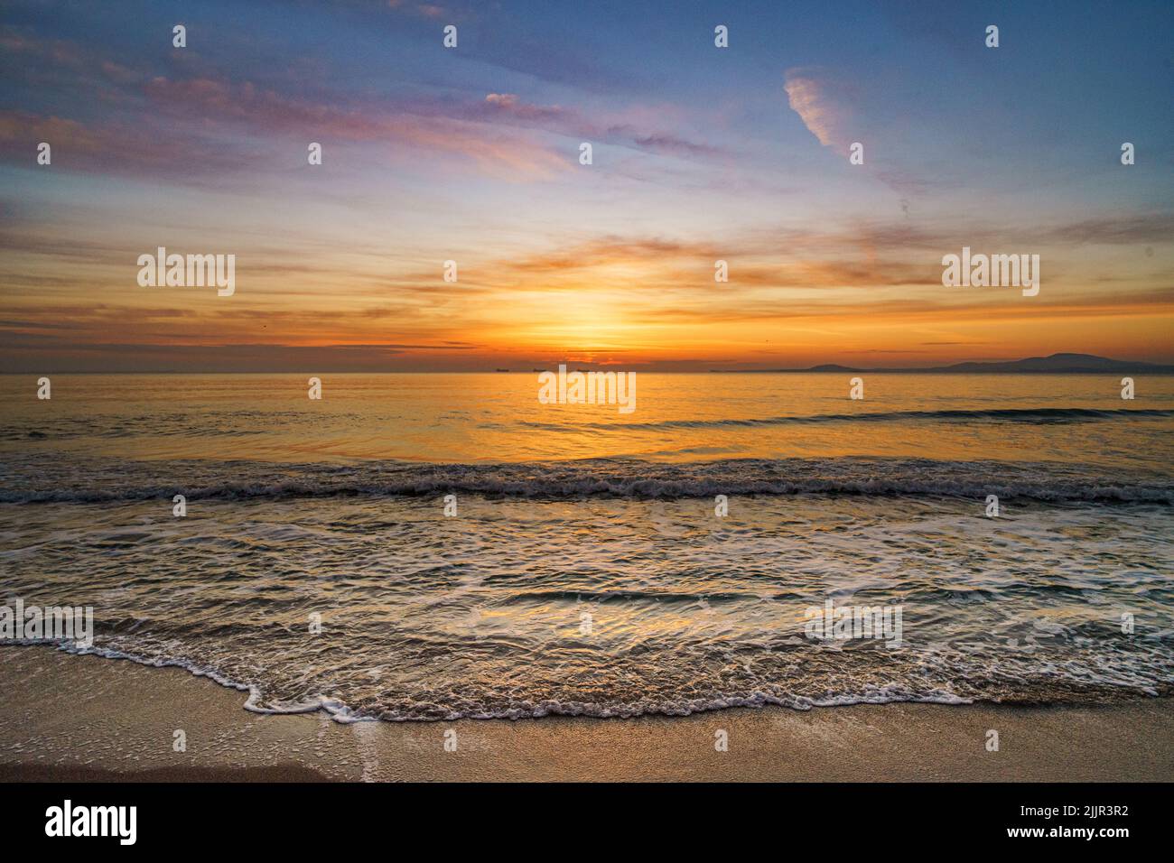 The beautiful sunset at the beach Stock Photo - Alamy