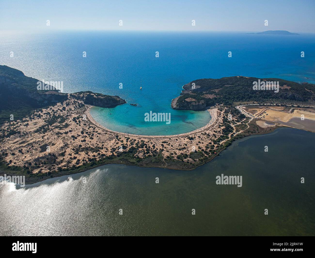 Aerial panorama view of the famous semicircular sandy beach and lagoon ...