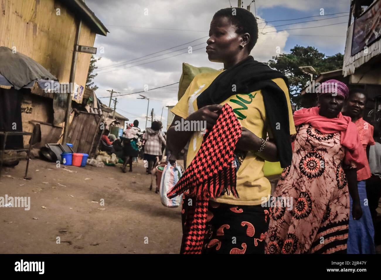 Nairobi, Kenya. 30th June, 2022. Residents walk past the busy streets ...