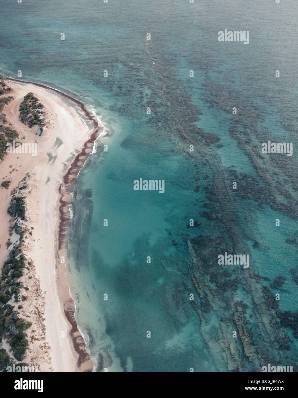 A vertical aerial view of shores of coral reefs Stock Photo - Alamy