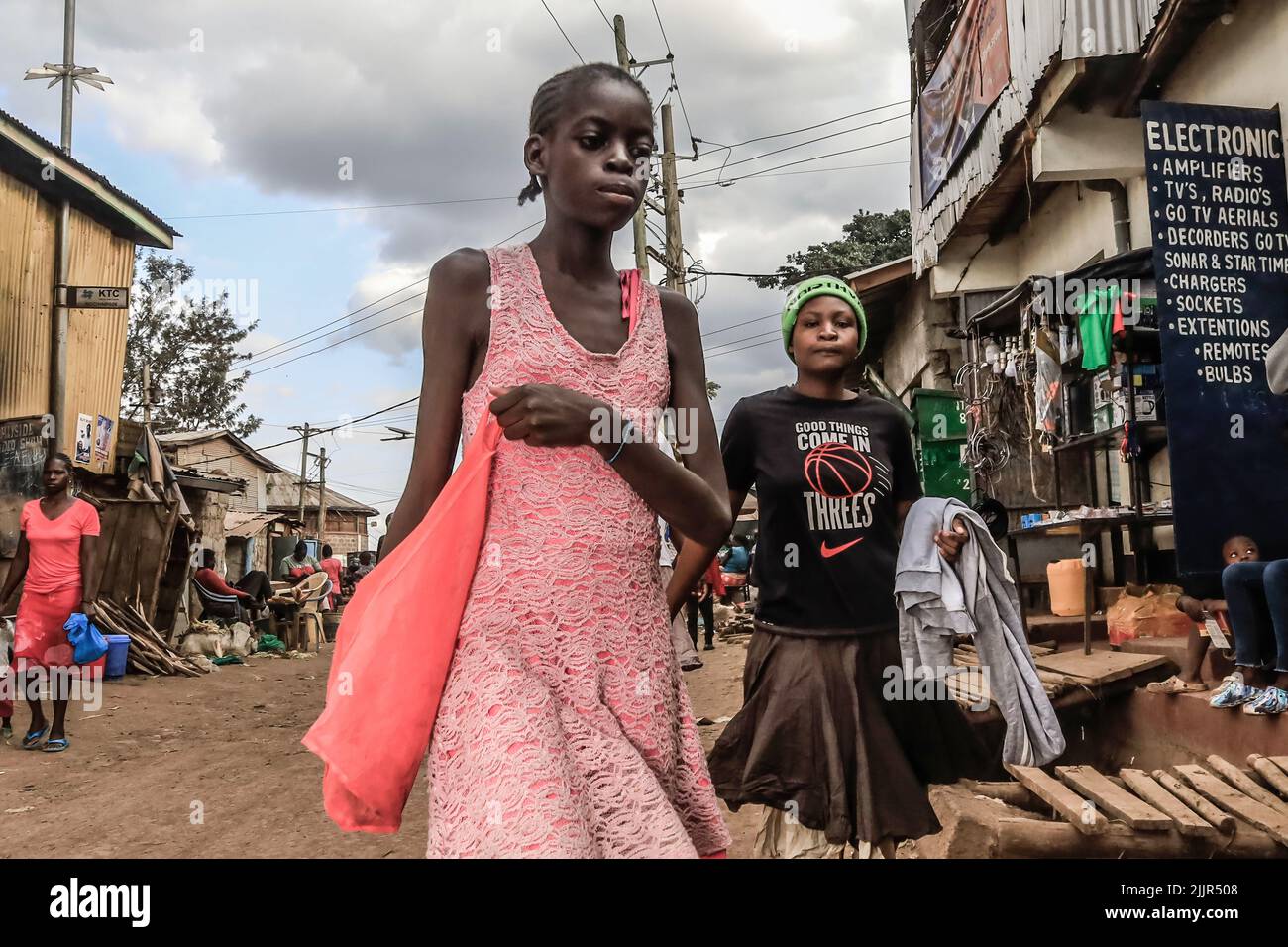 Nairobi, Kenya. 30th June, 2022. Residents walk past the busy streets ...