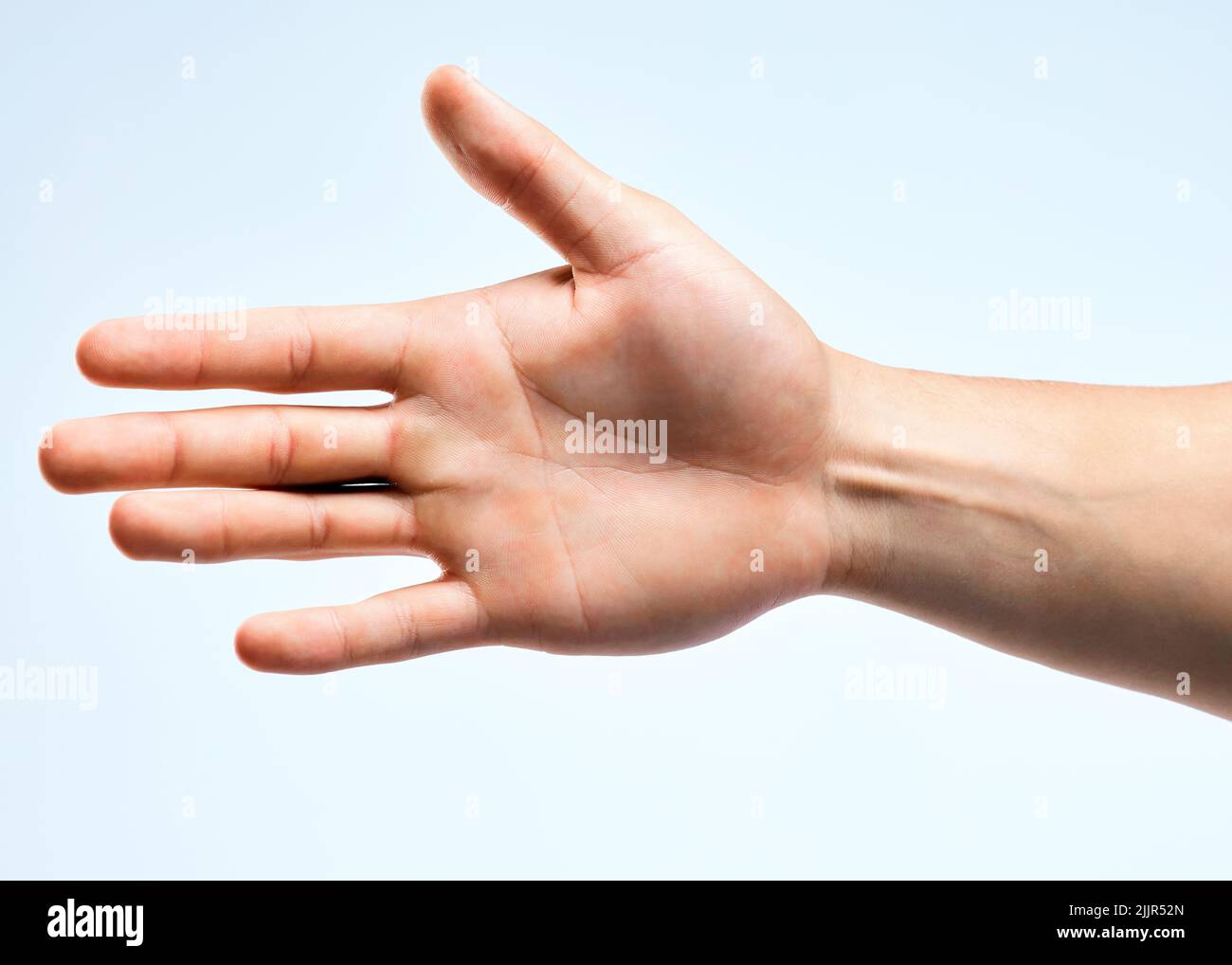 Were in business. an unrecognizable man holding out his hand for a ...