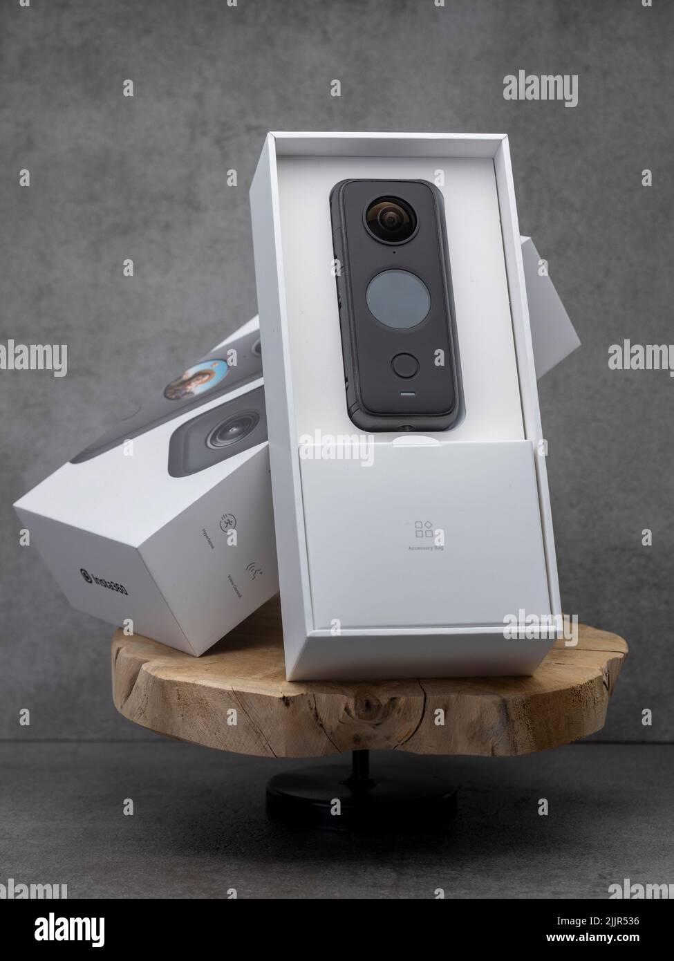 Contemporary Insta360 new package camera box on a wooden display stand ...