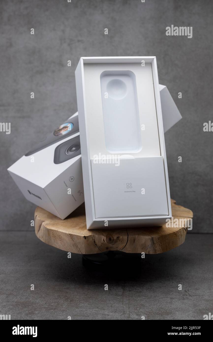 Empty Insta360 ONE X2 new package camera box on a wooden display stand ...