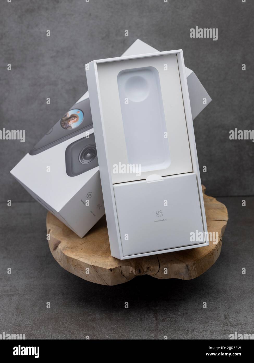Empty Insta360 ONE X2 new package camera box on a wooden display stand ...