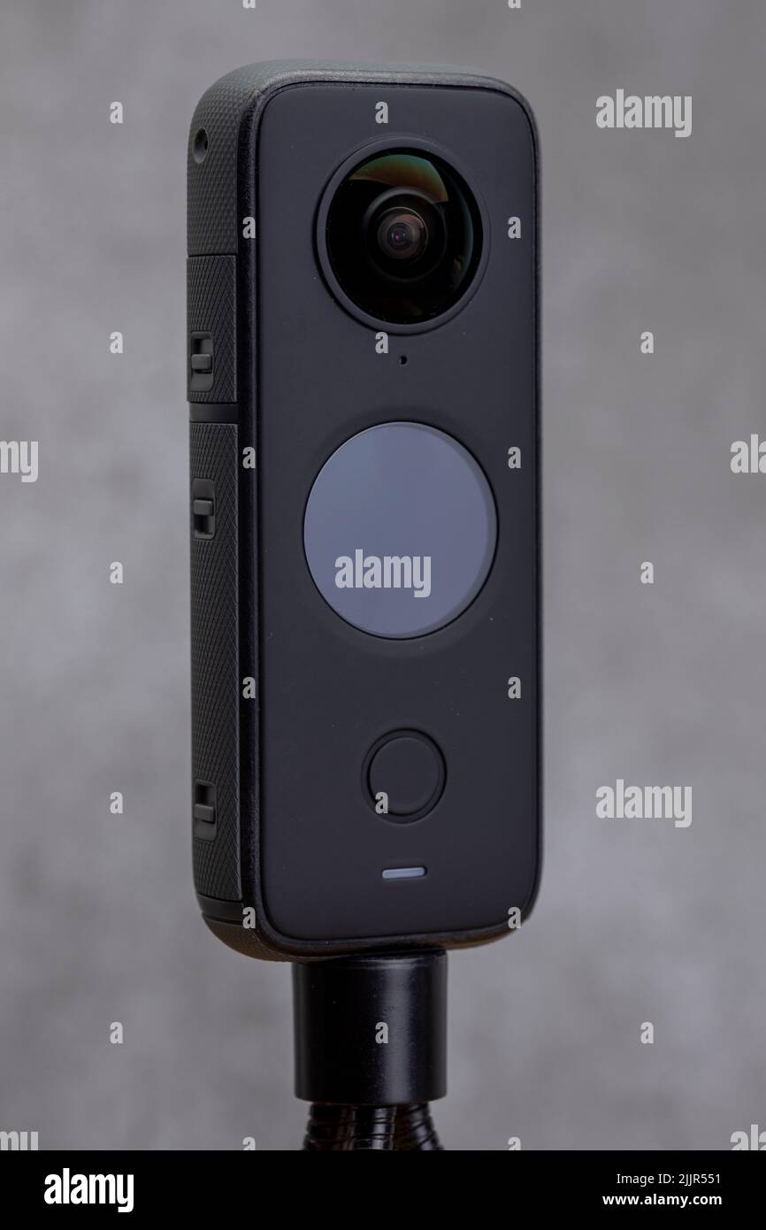 Screen front of new Insta360 camera with bulging lens against a modern ...