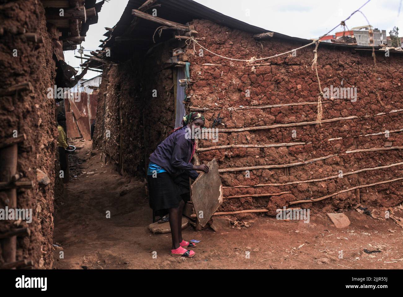 Nairobi, Kenya. 22nd July, 2022. A woman seen outside her house in ...