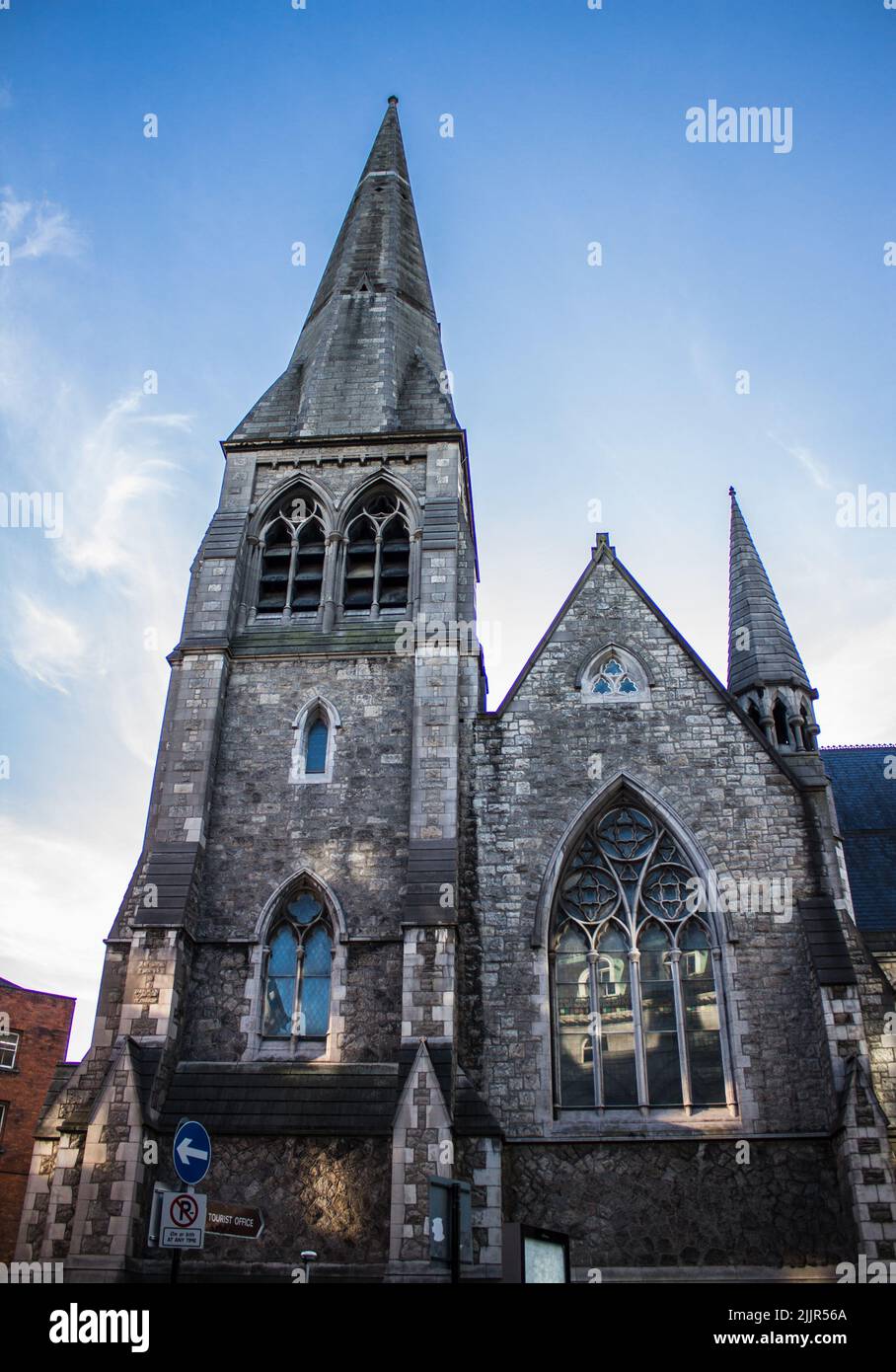 A low-angle shot of the St Andrew's Church in Dublin against a blue ...