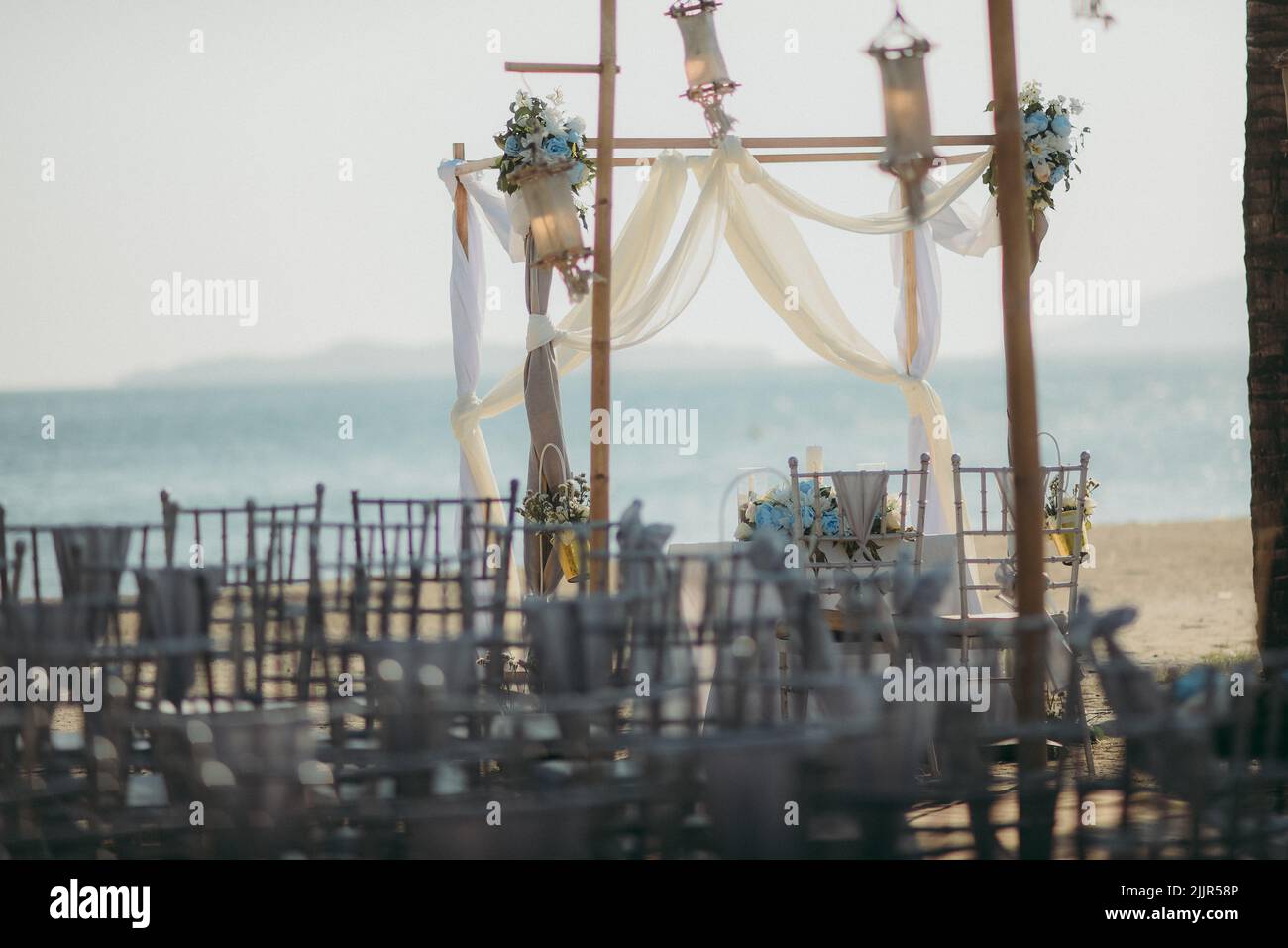 A beautiful view of the wedding setup at the beach on a sunny day Stock ...