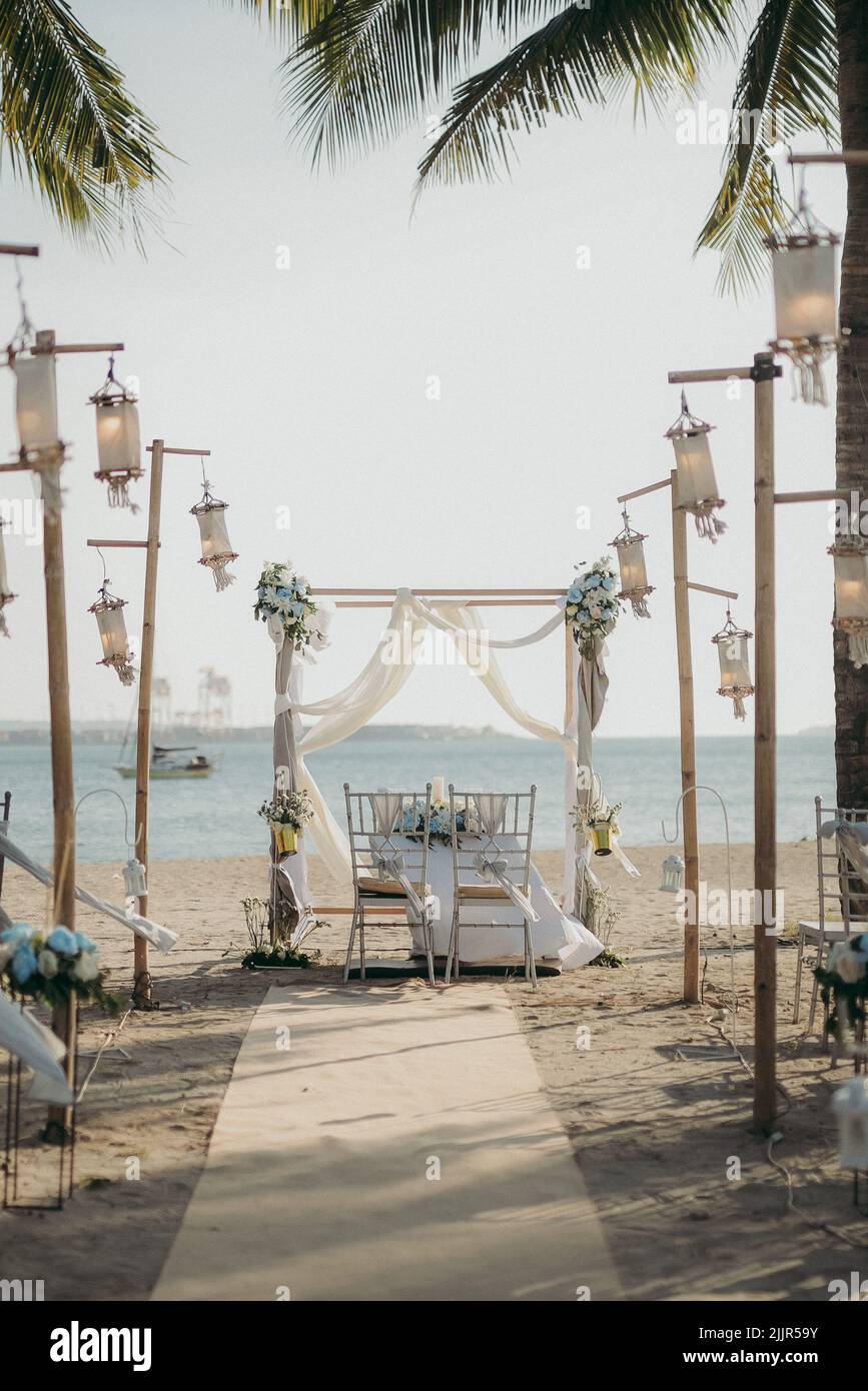 A vertical view of the wedding setup at the beach on a sunny day Stock ...