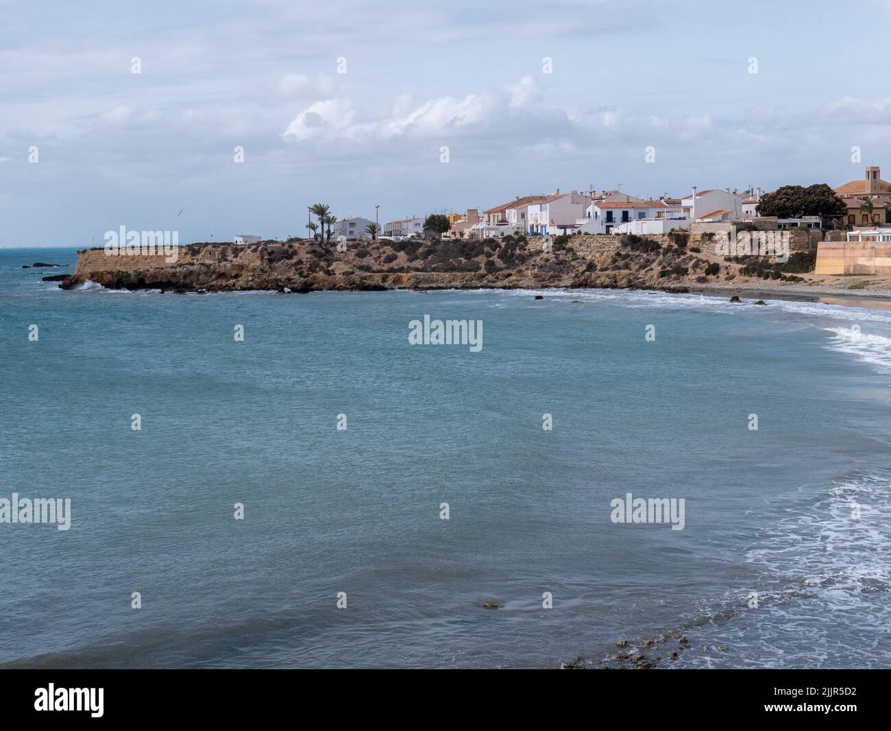 The beautiful rocky shore of Tabarca Island in Alicante, Spain Stock ...