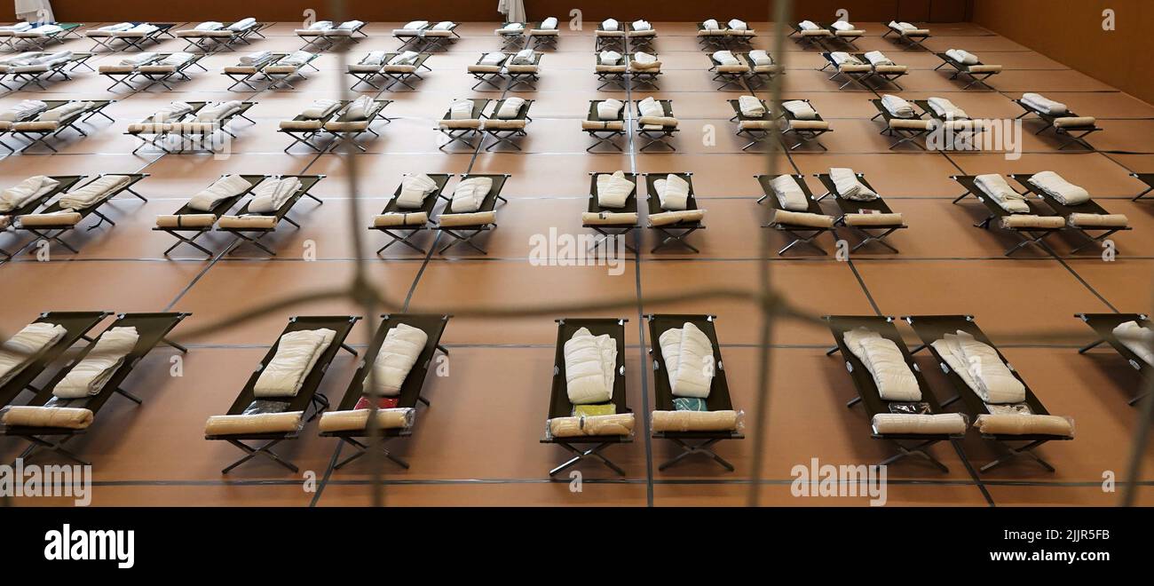 Hamburg, Germany. 27th July, 2022. Camp beds stand in an emergency ...